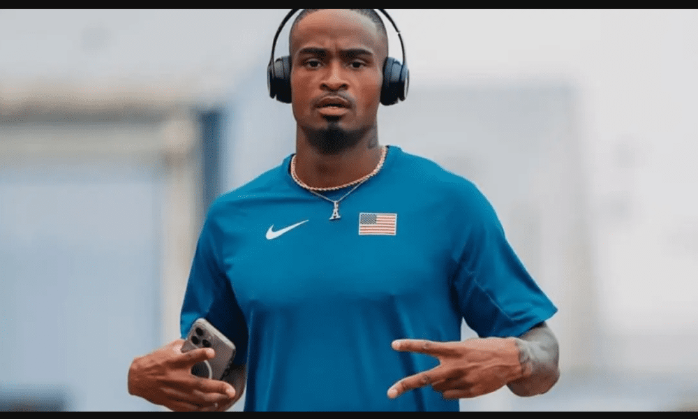 Quincy Hall's Smile Blinds the Crowd with His Golden Teeth!